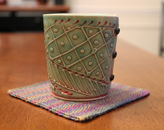 Ravelry: Reversible Mug Mat pattern by the river knitter