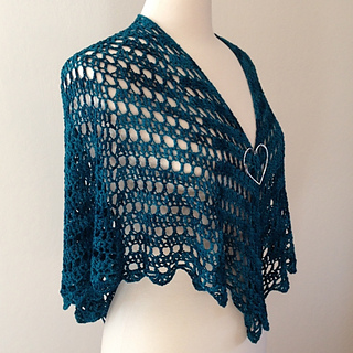 Ravelry: Sort of Half Circle Shawl pattern by PurpleIguana